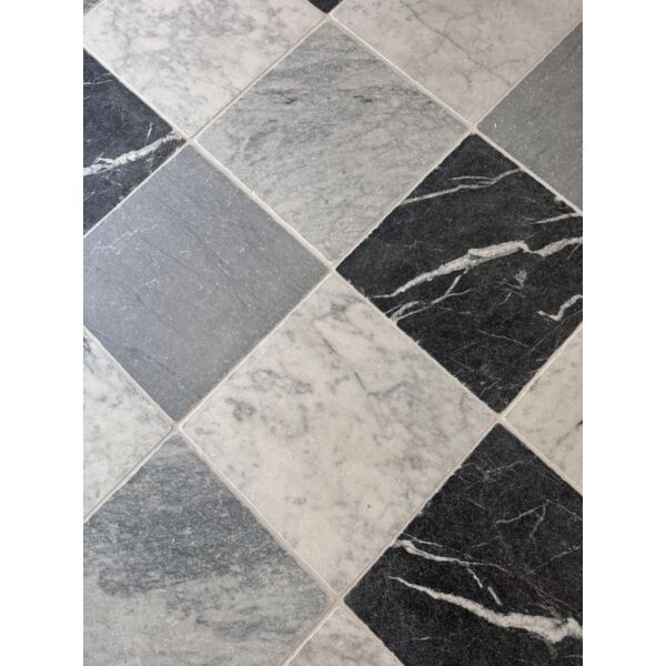 dark grey patterned floor tiles